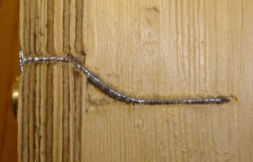 Experimental Investigations of the Shear Capacity of Nails in a Row
